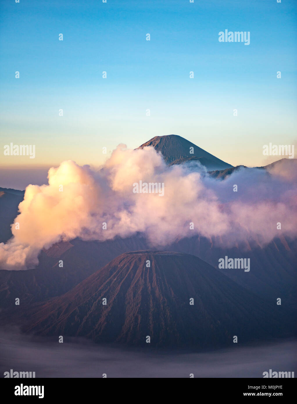 View of volcanoes at sunrise, smoking volcano Gunung Bromo, Batok, Mt ...
