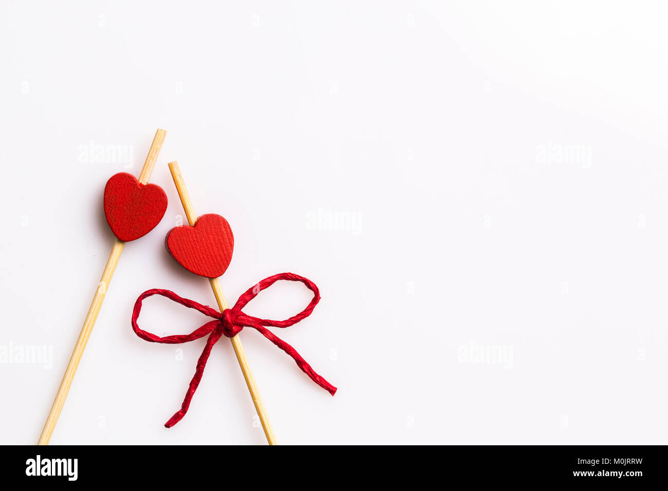Three handmade heart cupcake toppers on white background Stock Photo ...