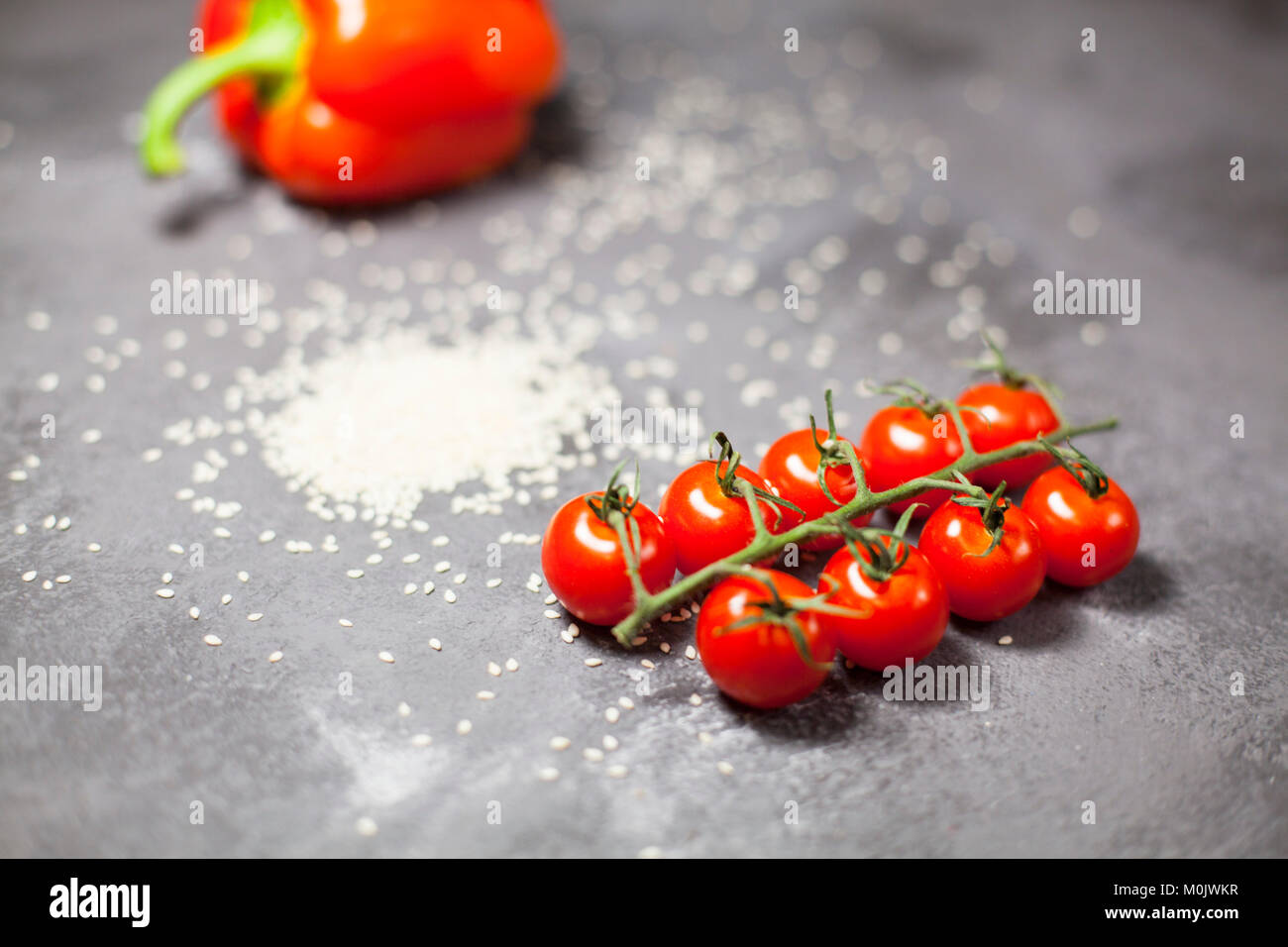 Peppers and cherry tomatoes Stock Photo - Alamy