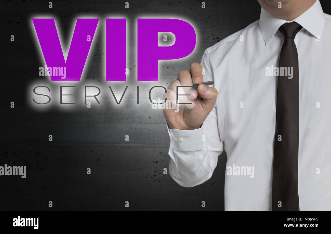 Vip service is written by businessman on screen Stock Photo - Alamy