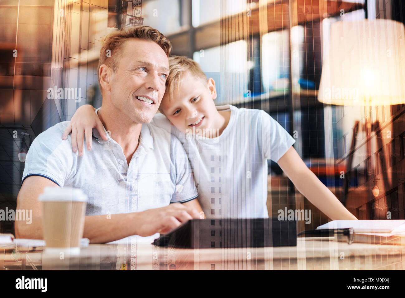 Young daddy being deep in thoughts Stock Photo - Alamy