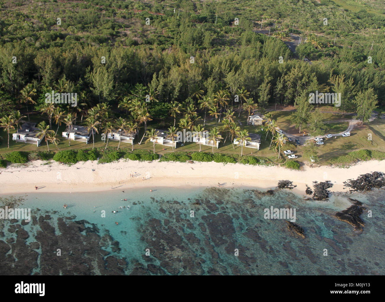 Small chalets on beach, view from helicopter, Savanne District ...