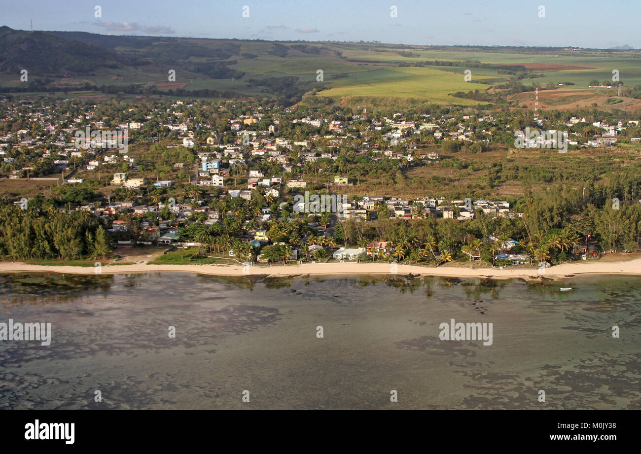 Village near beach seen from helicopter, Savanne district, Republic of ...
