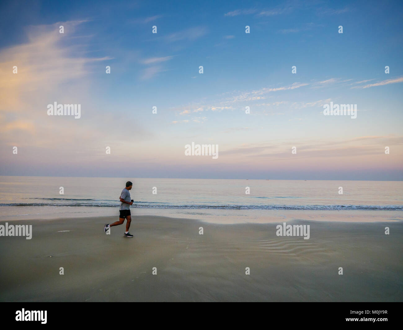 Indian man running hi-res stock photography and images - Alamy