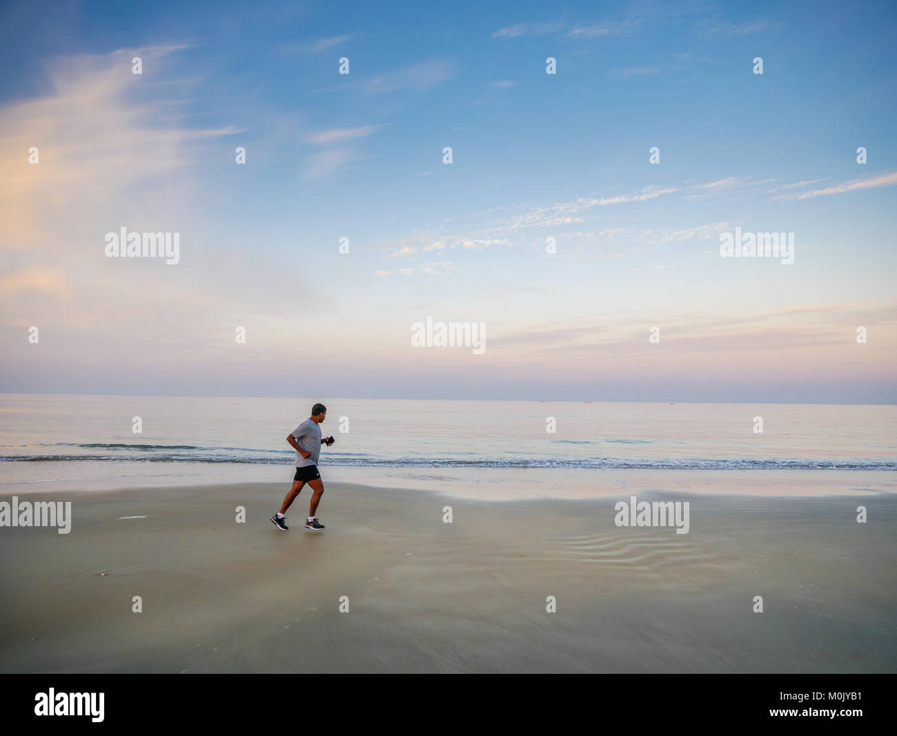 Indian man running hi-res stock photography and images - Alamy