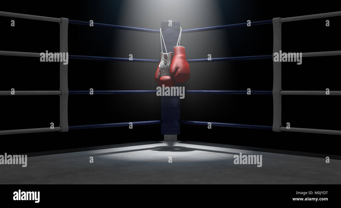 The blue corner of a boxing ring with gloves hanging on a pole spotlit ...
