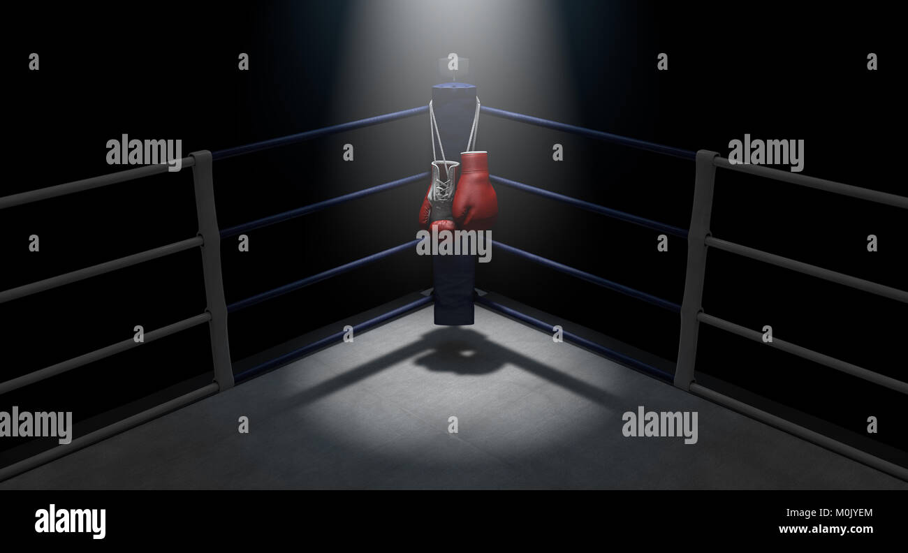The blue corner of a boxing ring with gloves hanging on a pole spotlit ...