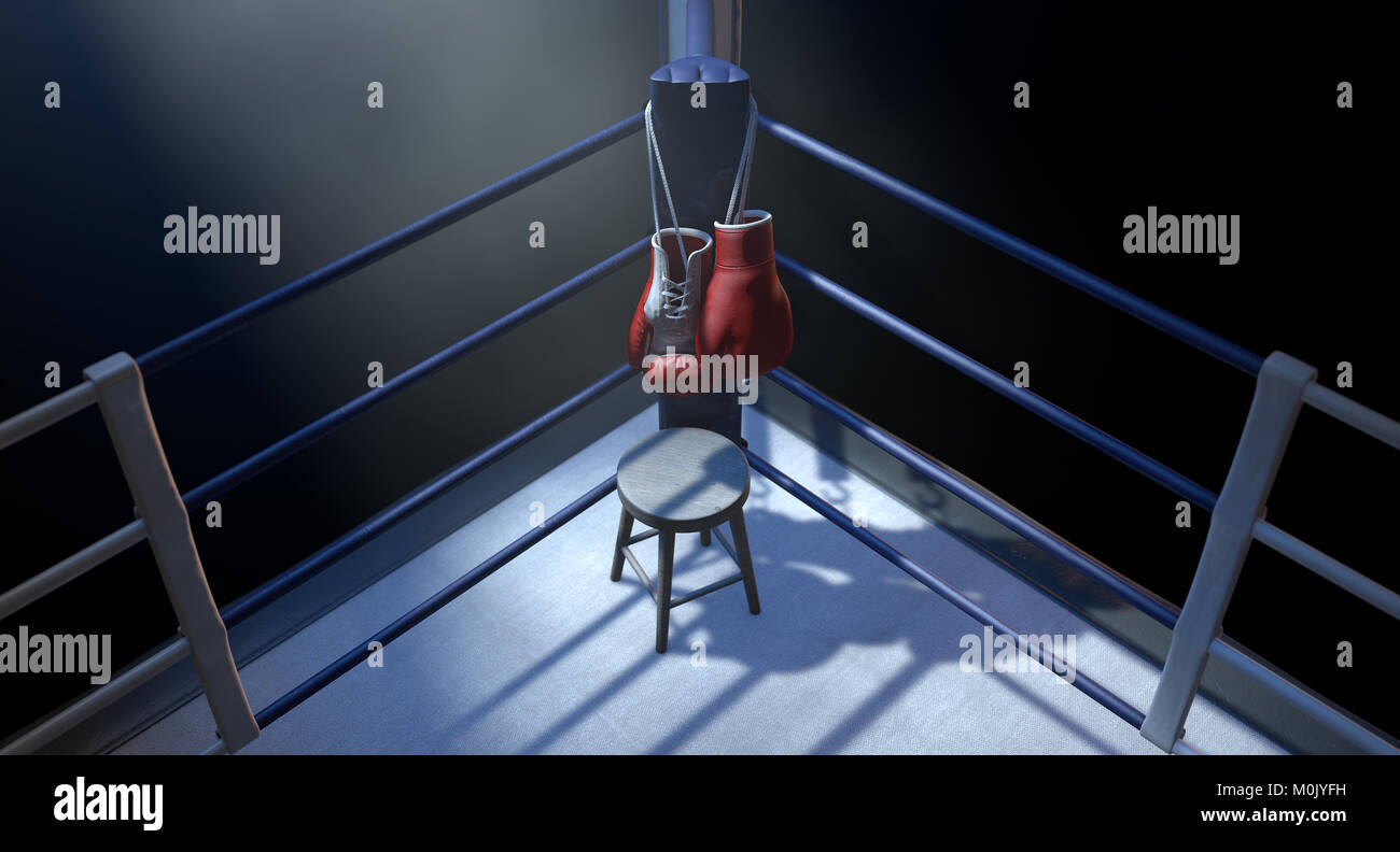 The blue corner of a boxing ring with gloves hanging on a pole spotlit ...