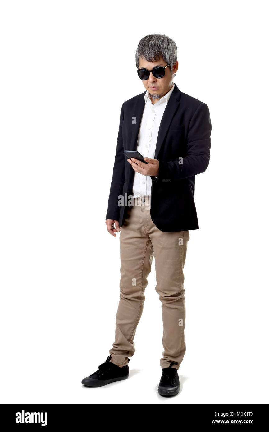 The Asian man standing on the white background Stock Photo - Alamy
