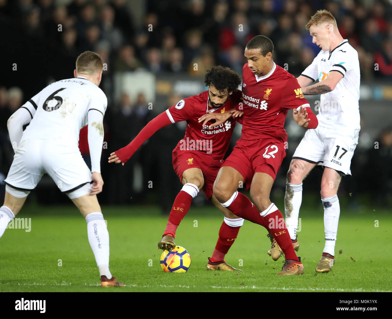 Liverpools mohamed salah controls ball hi-res stock photography and ...