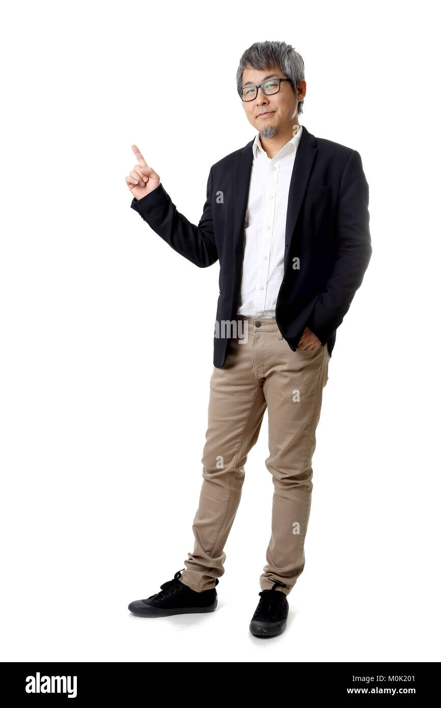 The Asian man standing on the white background Stock Photo - Alamy