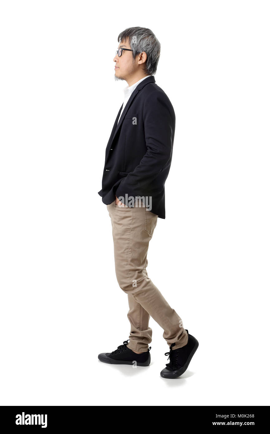 The Asian man standing on the white background Stock Photo - Alamy