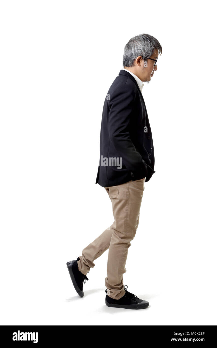 The Asian man standing on the white background Stock Photo - Alamy