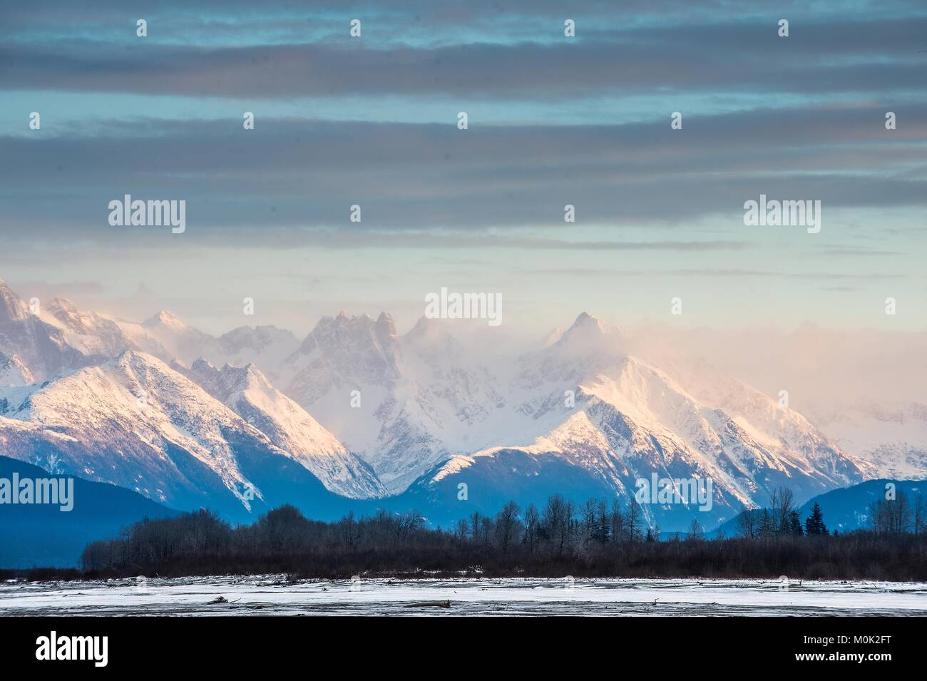 Chilkat River and Mountains in snow on a sunrise. Alaska.USA Stock ...