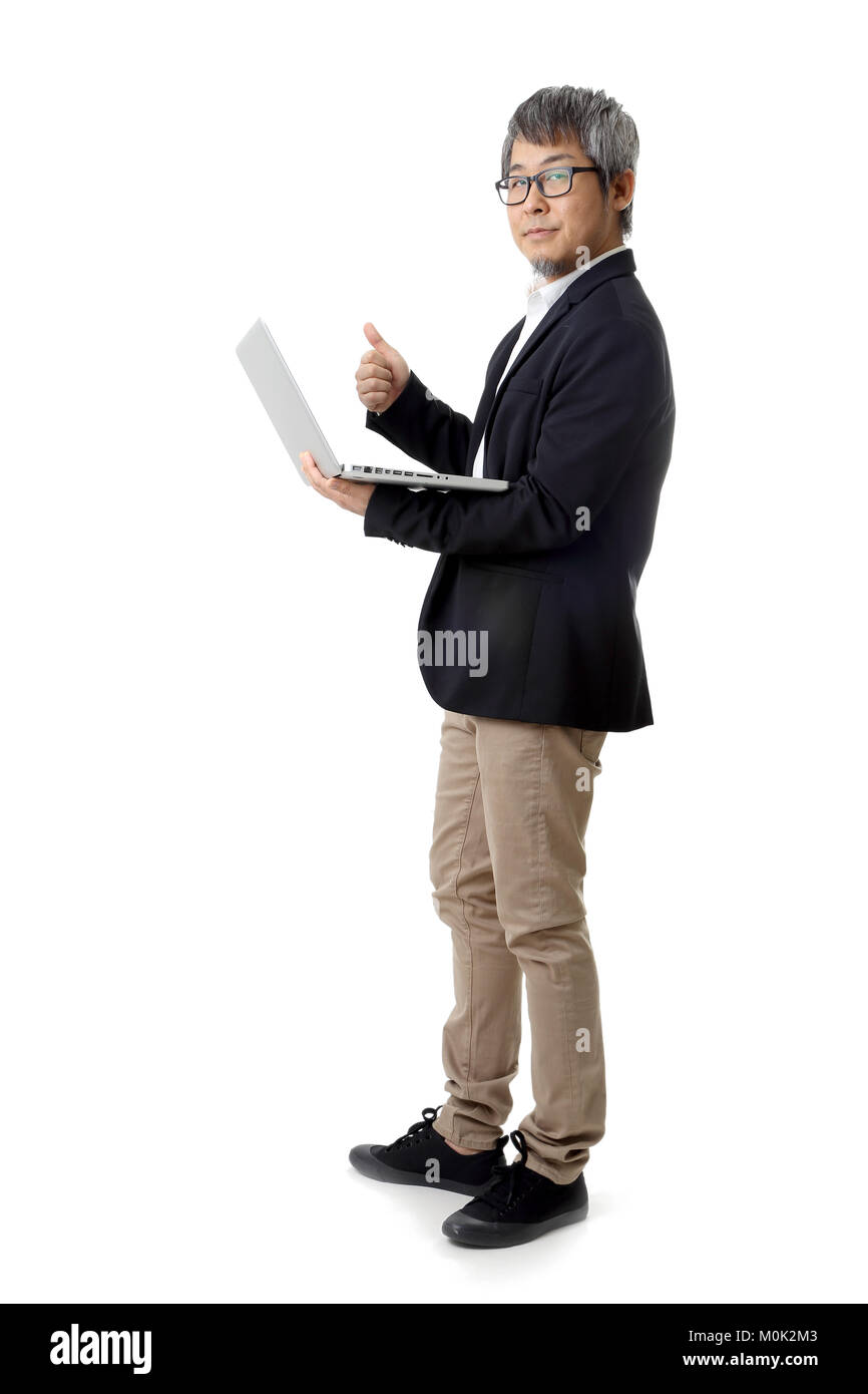 The Asian man standing on the white background Stock Photo - Alamy