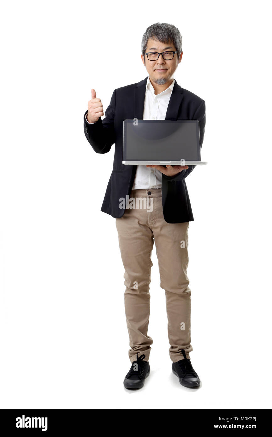 The Asian man standing on the white background Stock Photo - Alamy