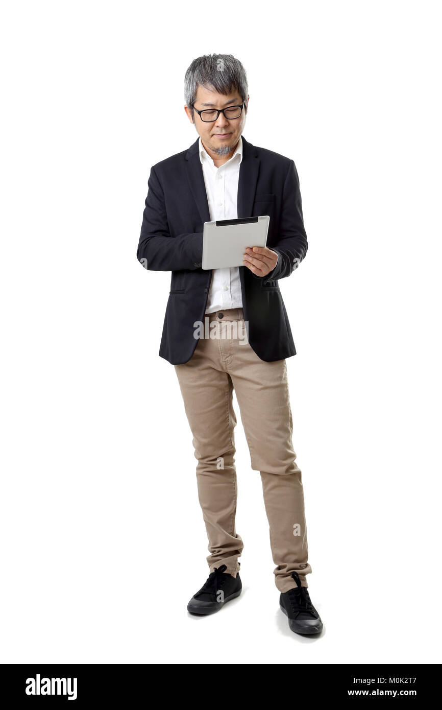 The Asian man standing on the white background Stock Photo - Alamy
