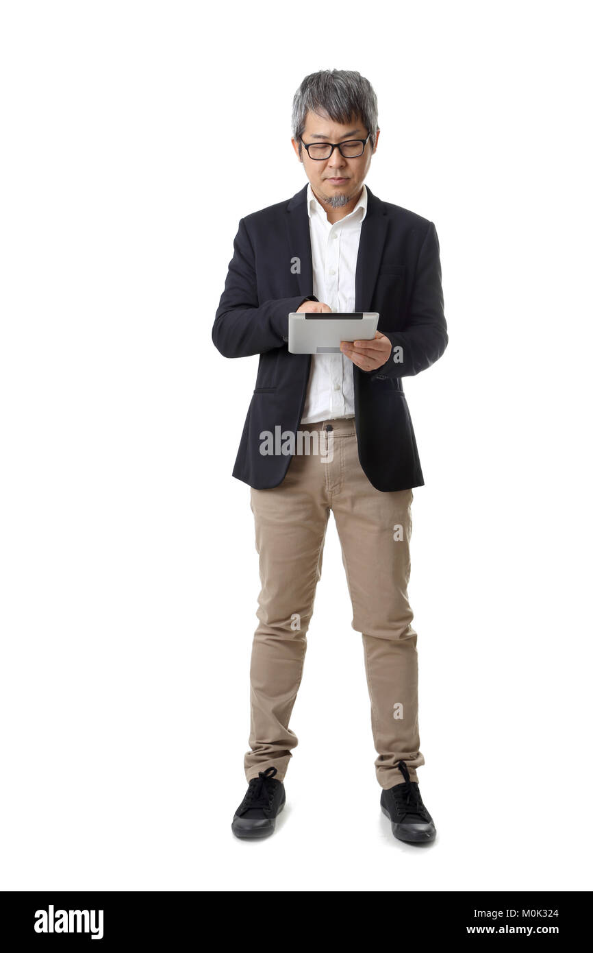 The Asian man standing on the white background Stock Photo - Alamy