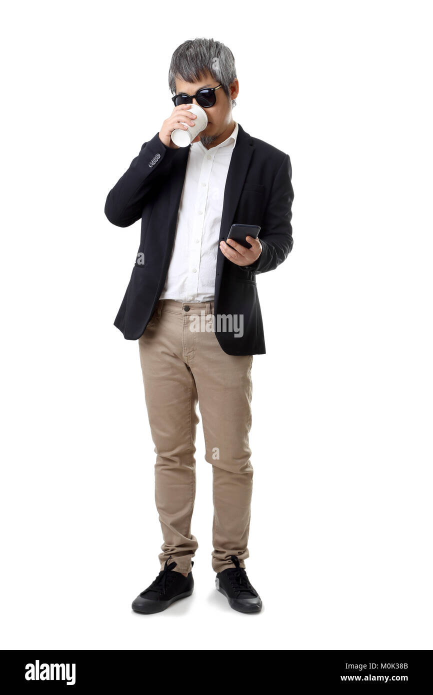 The Asian man standing on the white background Stock Photo - Alamy