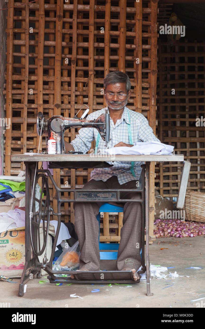 India, Karnataka, Badami, Tailor with sewing machine Stock Photo - Alamy