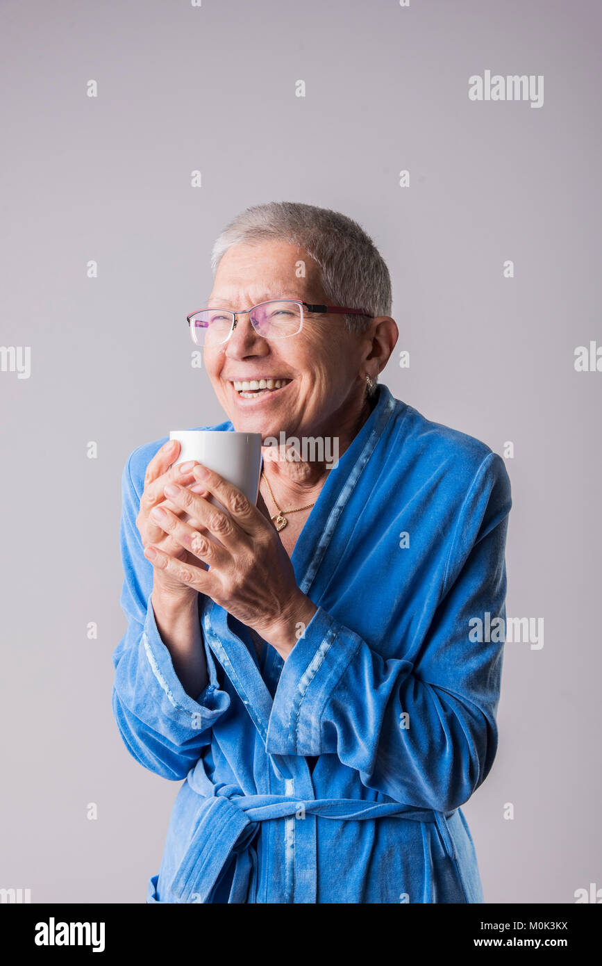 Older woman enjoying coffee hi-res stock photography and images - Alamy