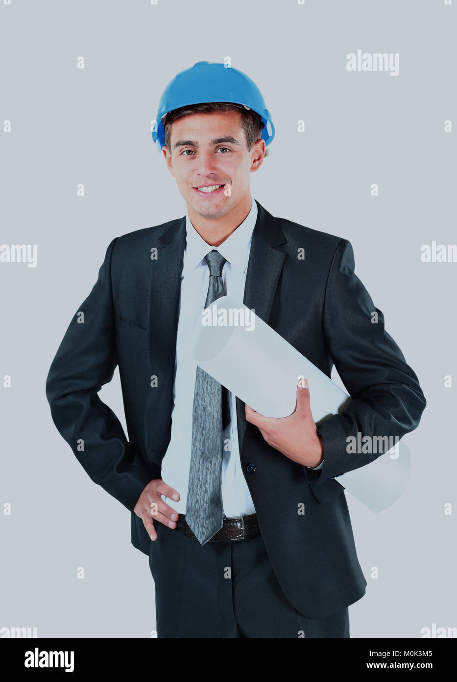 Young engineer smiling isolated on white background Stock Photo - Alamy