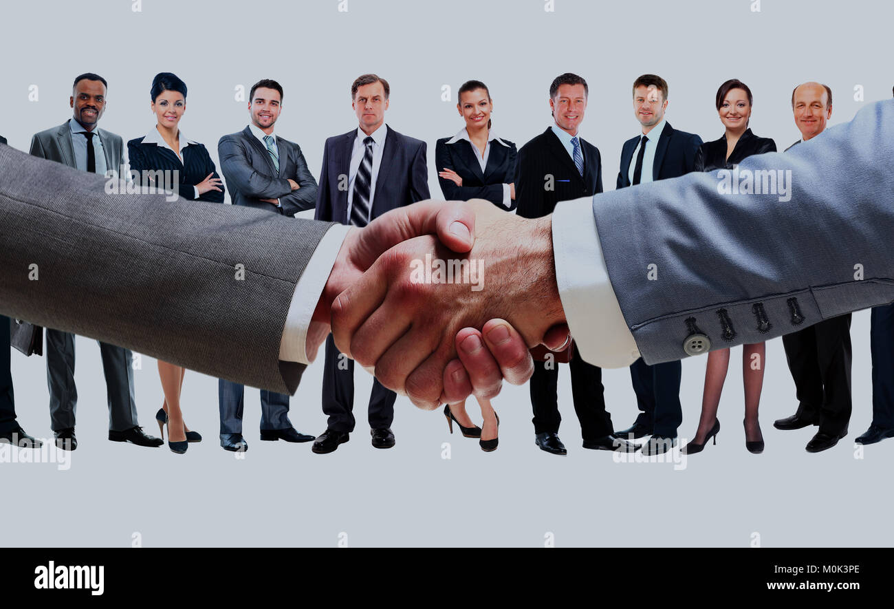 handshake on the background group of business people Stock Photo - Alamy