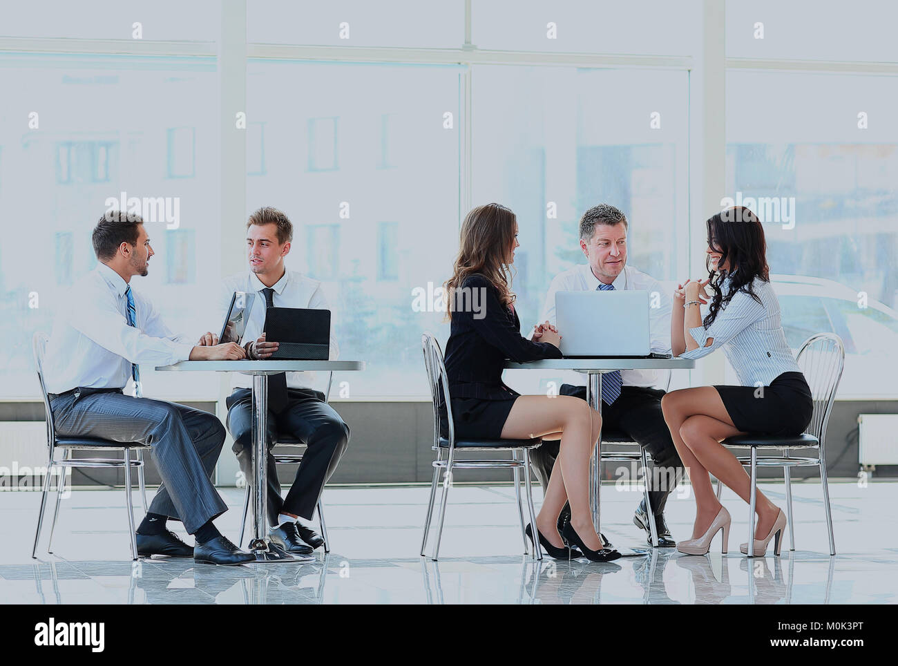 Business team working in an office Stock Photo - Alamy