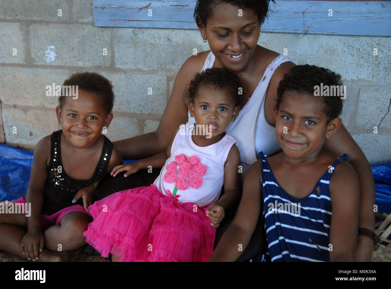 Mother and her 3 children, Rakirali, Fiji Stock Photo - Alamy
