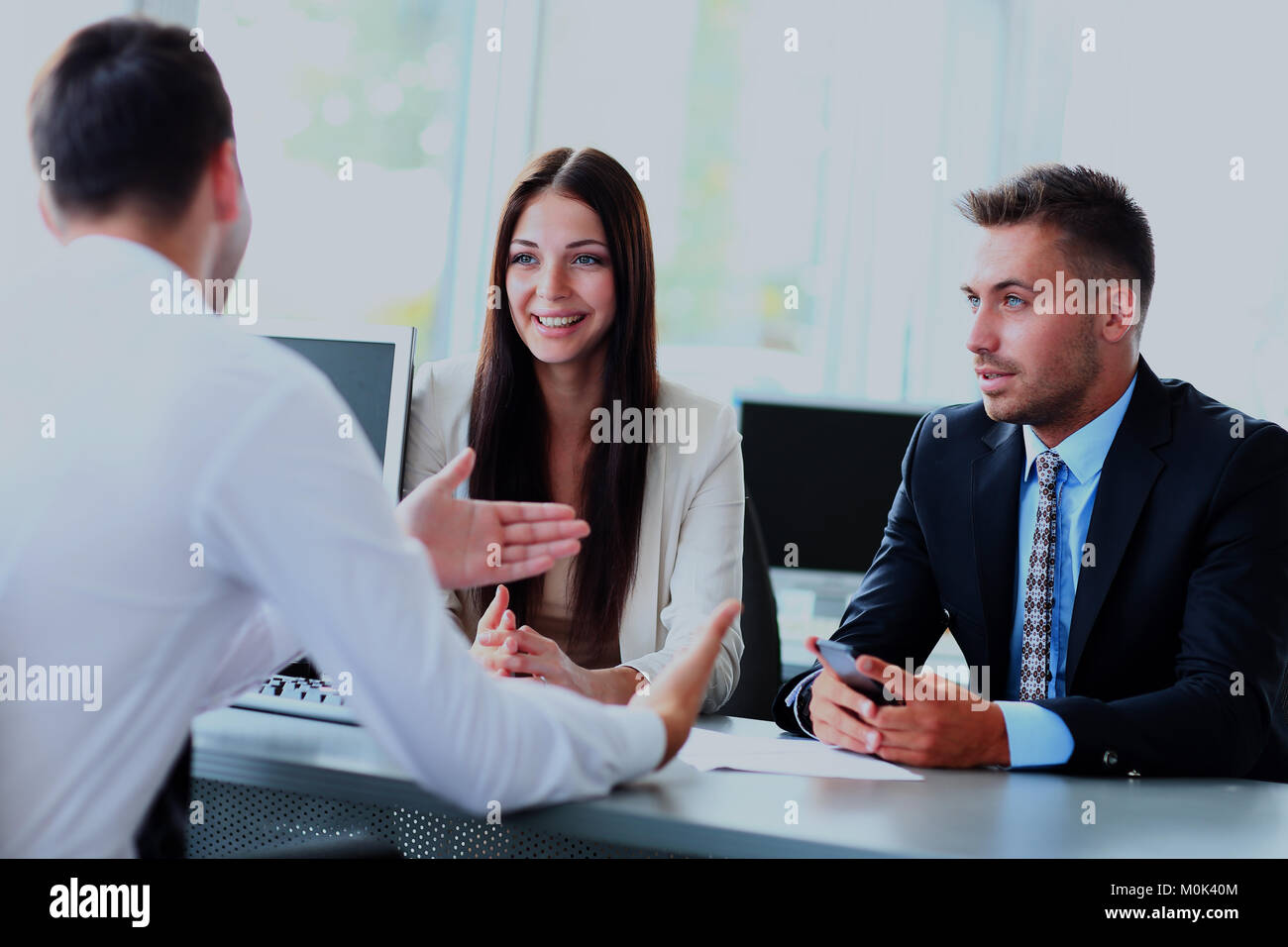 Business people speaking during interview in their office Stock Photo ...