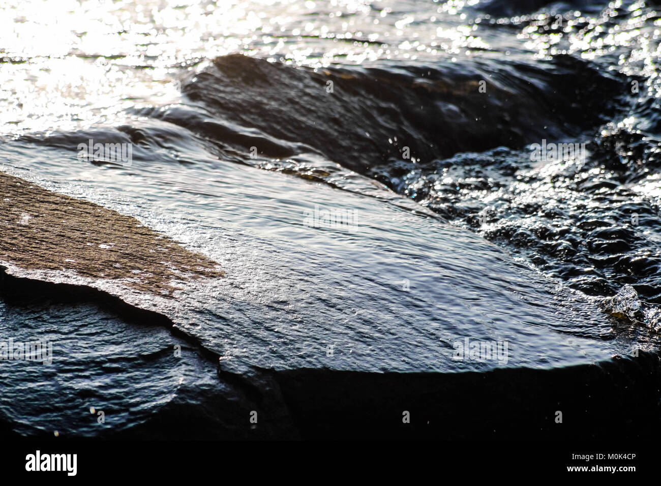 Surface water flowing from waterfall hi-res stock photography and ...