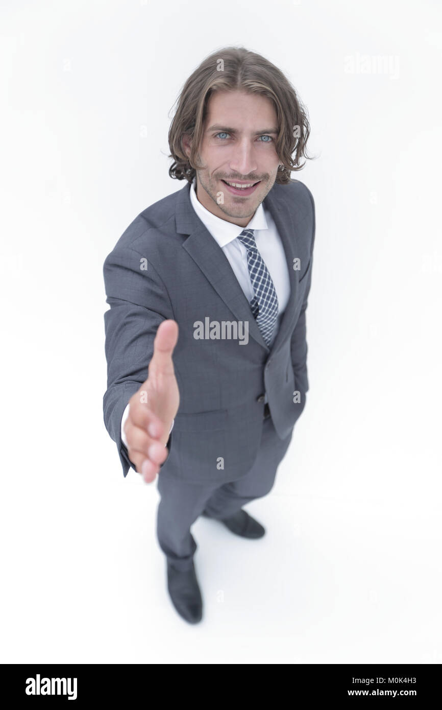Business man extending hand to shake - focus om hand Stock Photo - Alamy