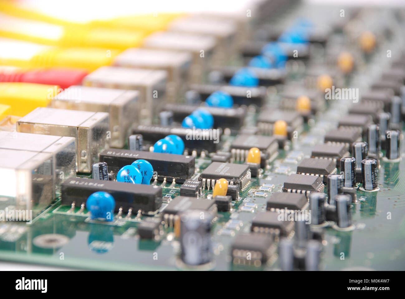 Macro close-up RJ45 network plugs red and yellow. Connect to circuit ...