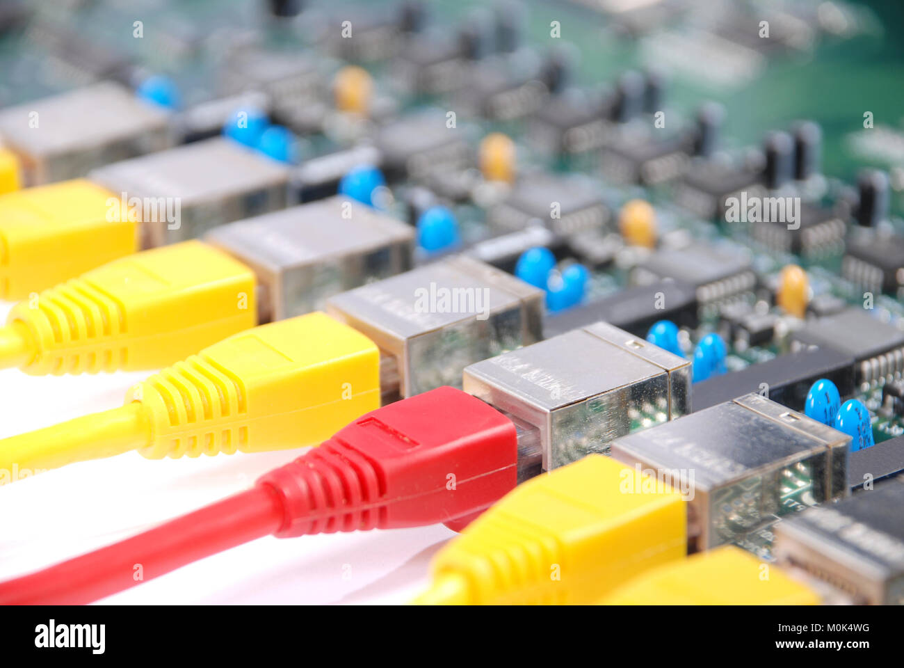 Macro close-up RJ45 network plugs red and yellow. Connect to circuit ...
