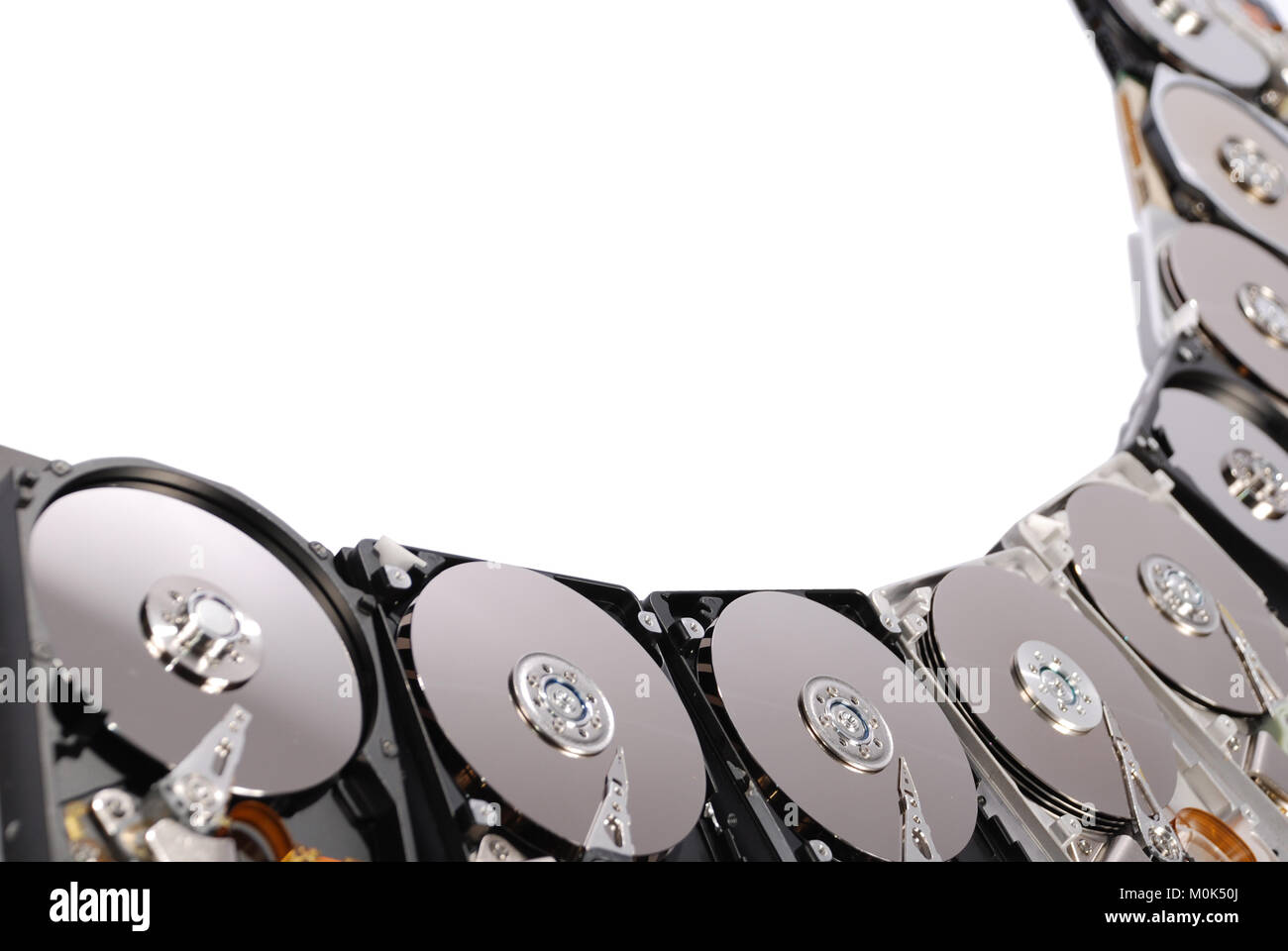 Many Open Hard drives isolated on white background. Frame àre combined ...
