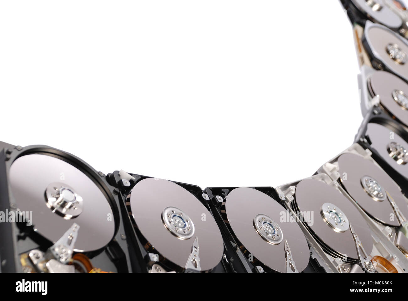 Many Open Hard drives isolated on white background. Frame àre combined ...