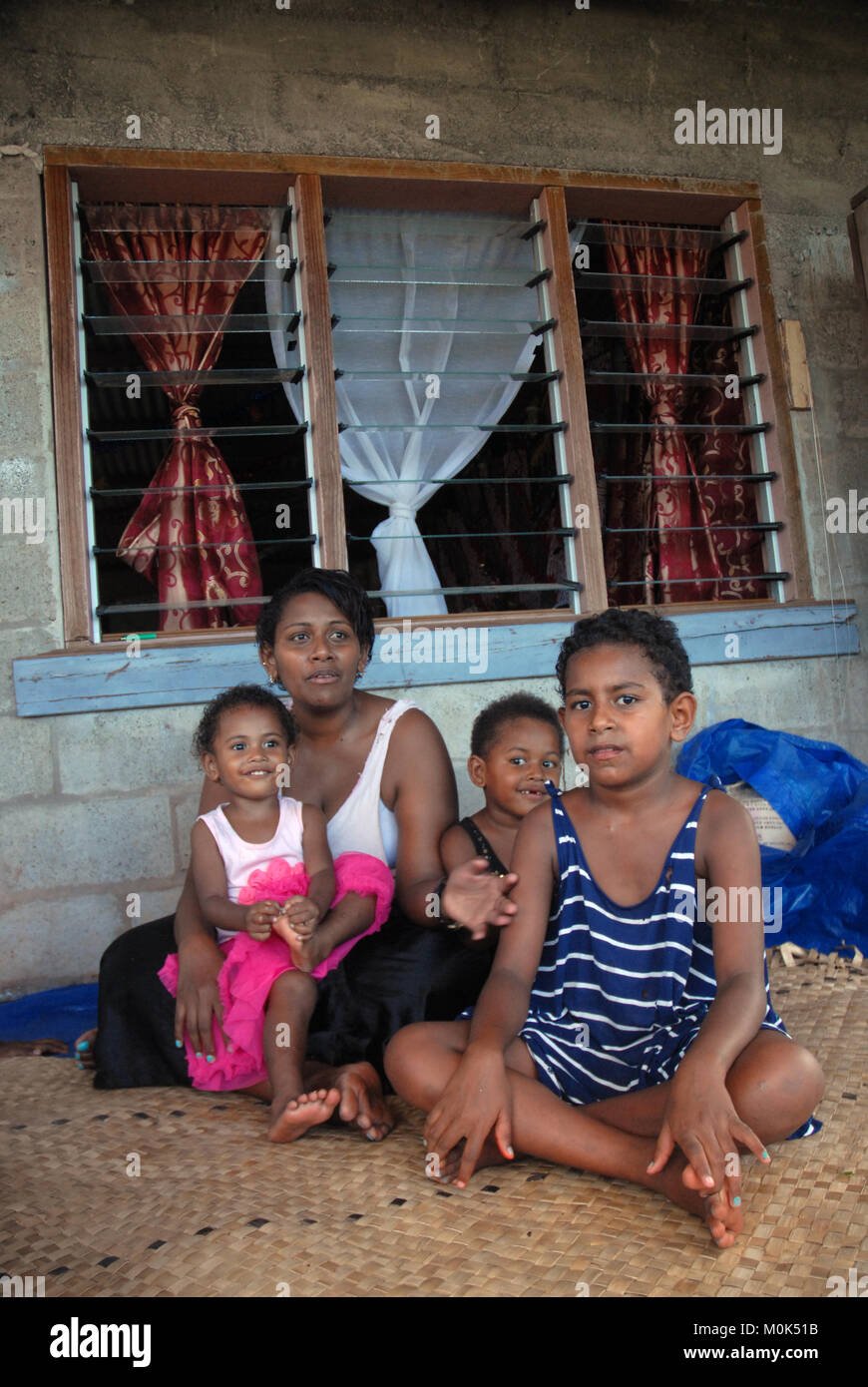 Mother and her 3 children, Rakirali, Fiji Stock Photo - Alamy