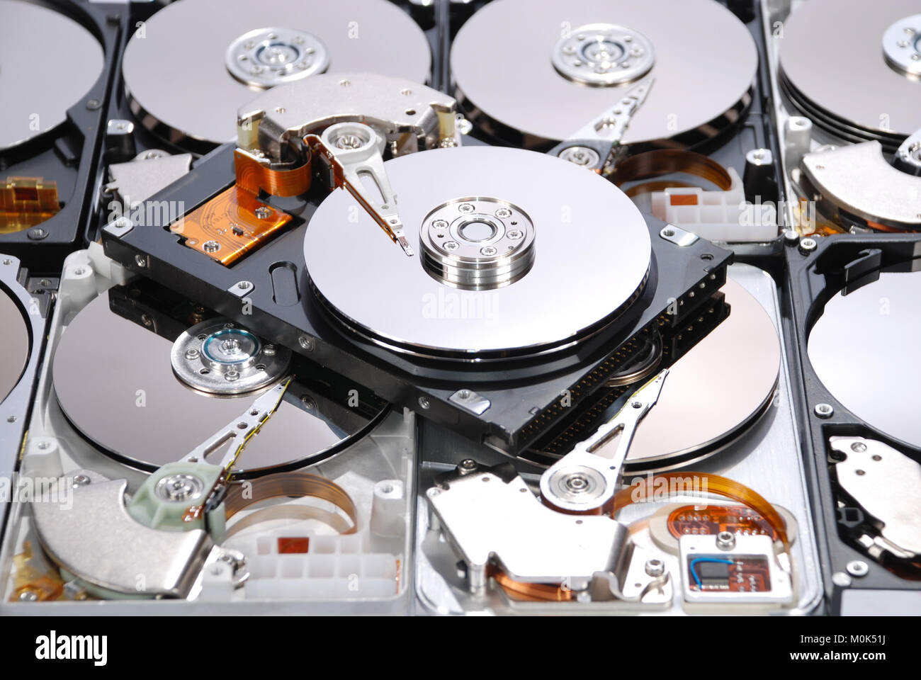 Many Open Hard drives isolated on white background Stock Photo - Alamy