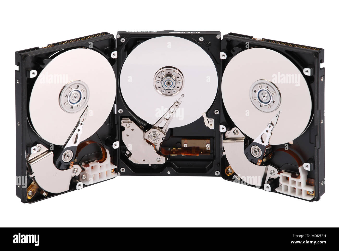 Many Open Hard drives isolated on white background. Are combined by a ...
