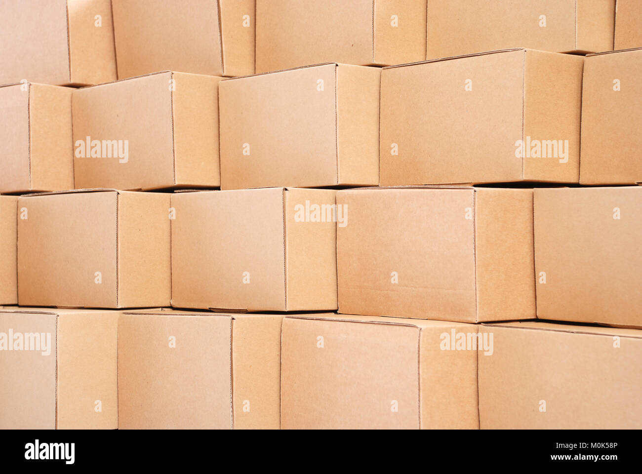Cardboard boxes background on brown color Stock Photo - Alamy