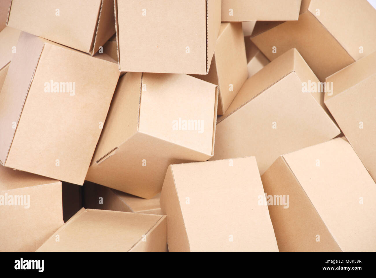 Cardboard boxes background on brown color Stock Photo - Alamy