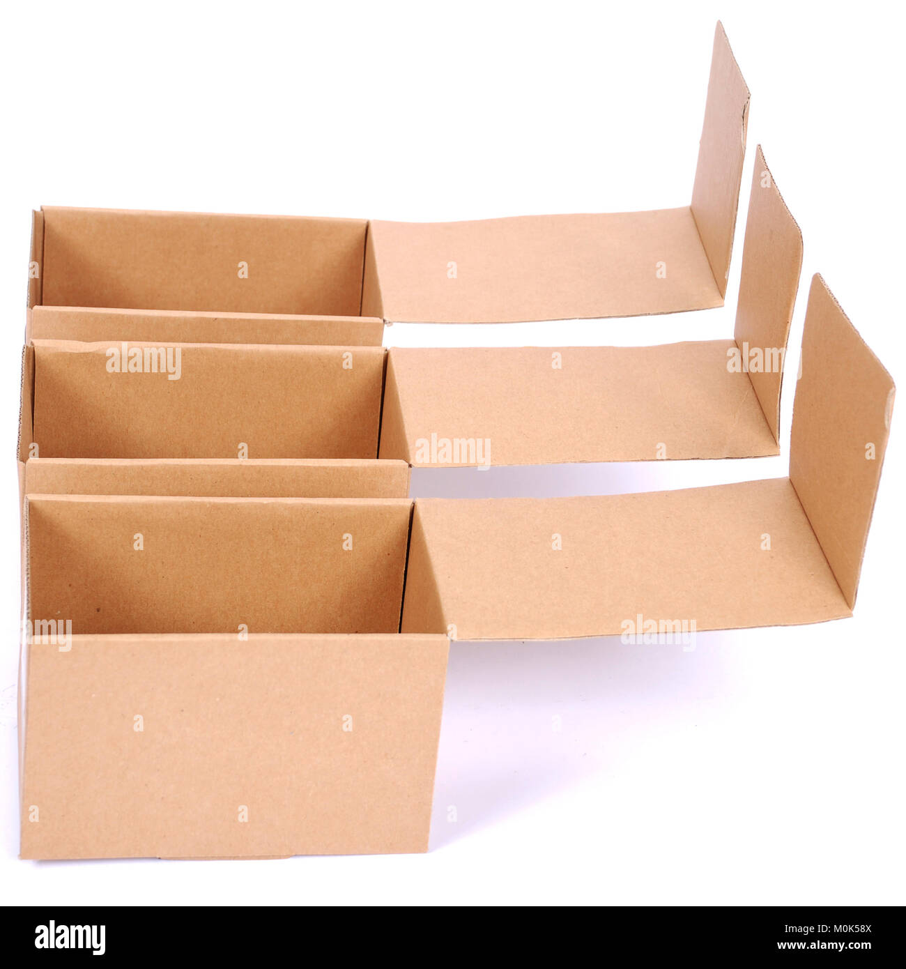 Close-up of three open cardboard boxes againt white background Stock ...