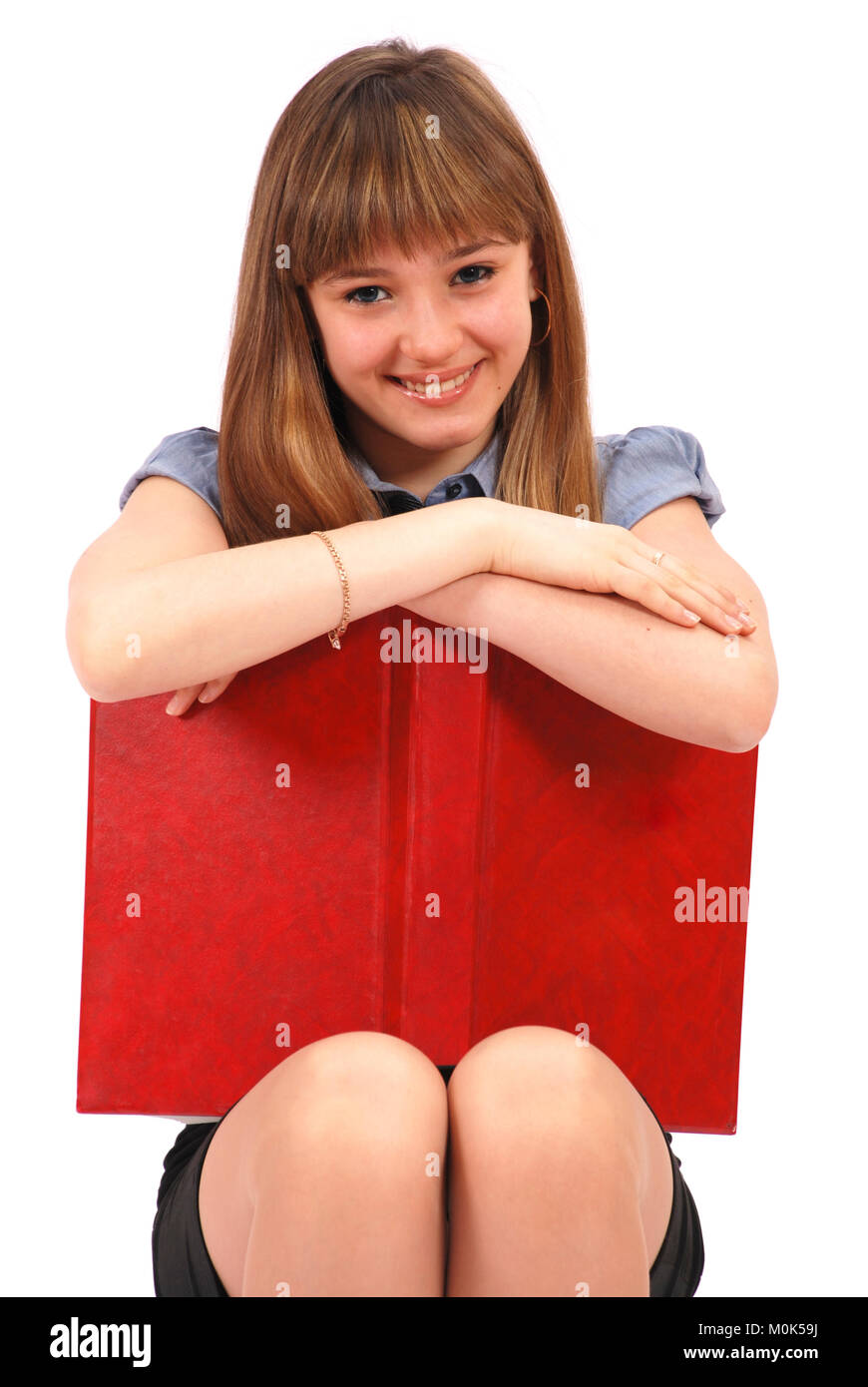 Girl holds the open book on white background Stock Photo - Alamy