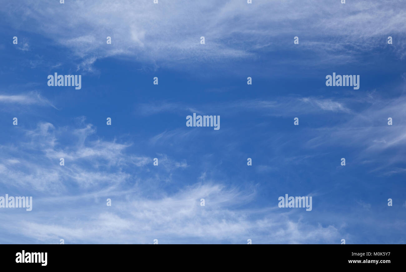 Vibrant blue sky background with clouds Stock Photo - Alamy