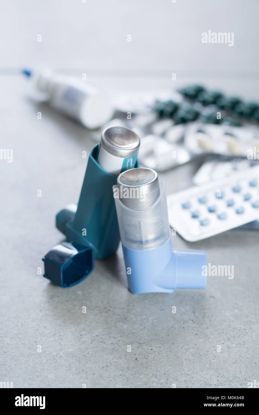 Pills and inhalers for asthma, bronchitis, lungs diseases, first aid ...