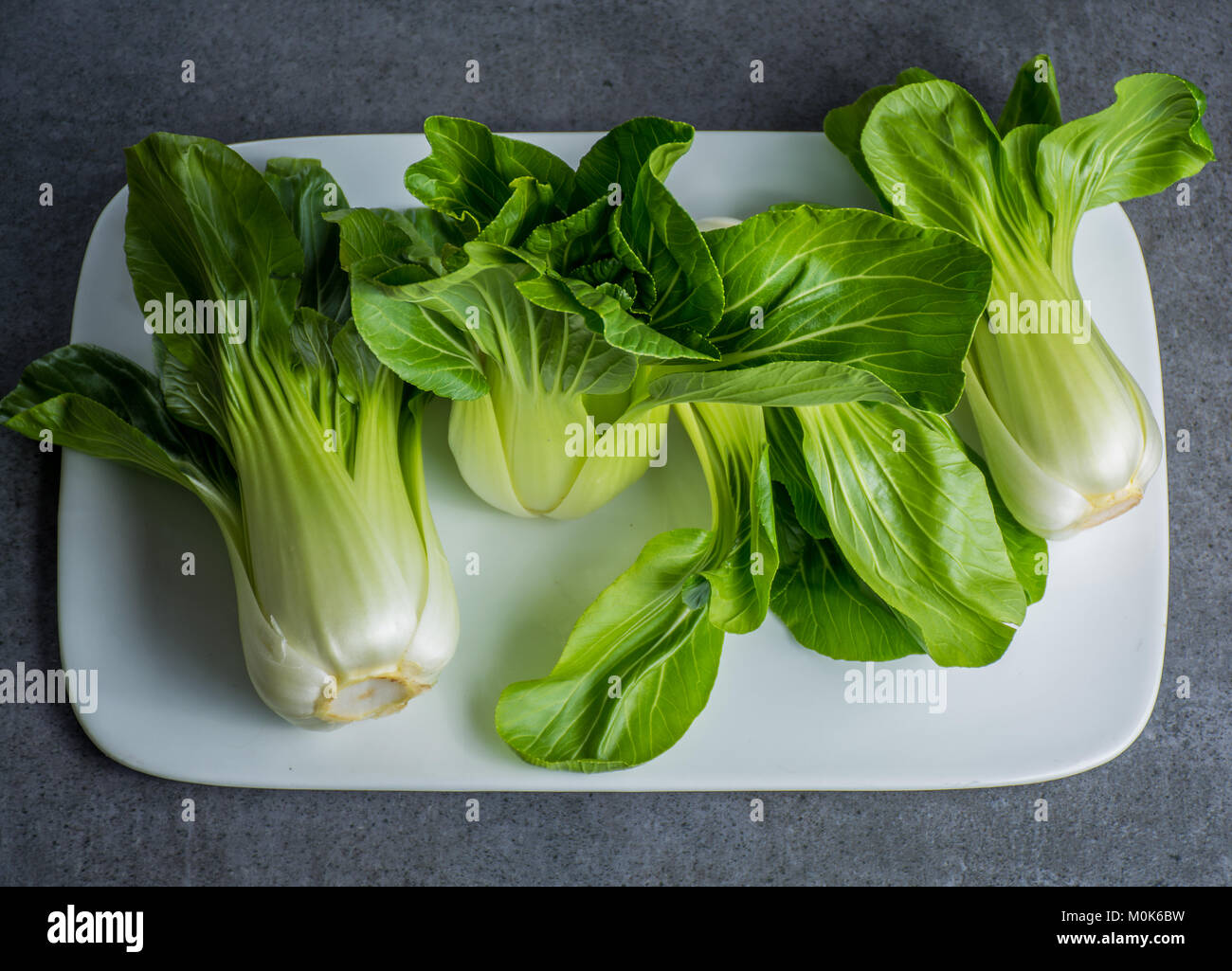 Fresh raw green baby Bok choy or pak choi Chinese cabbage Stock Photo ...