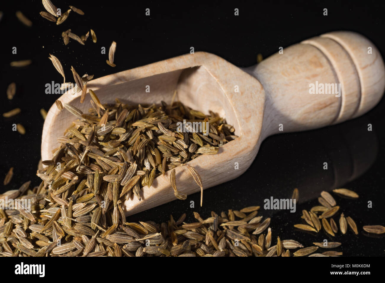 Macro collection, aromatic dried seasoning cumin close up on black ...