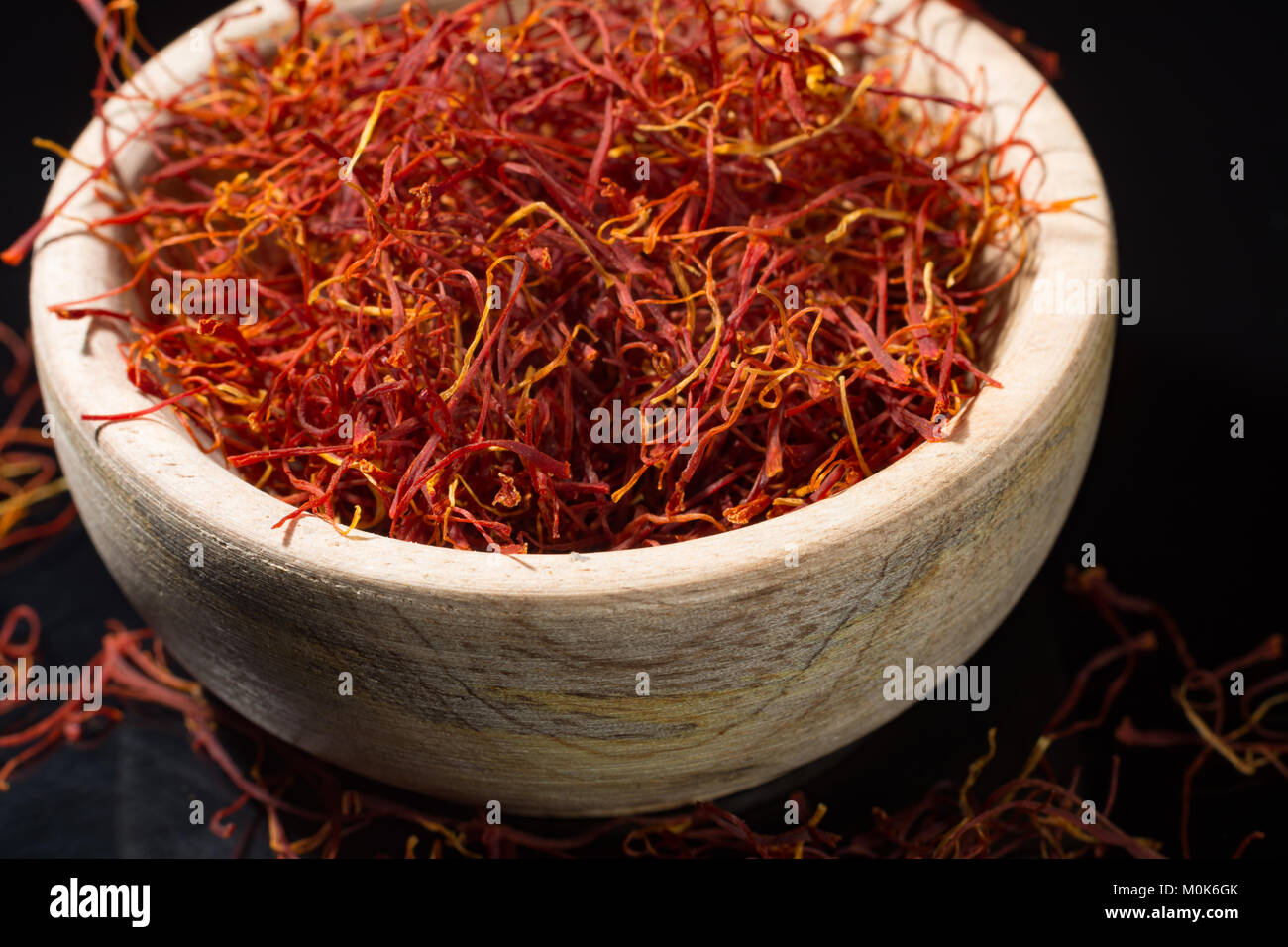 Macro collection, expensive real dried saffron spice close up on black ...