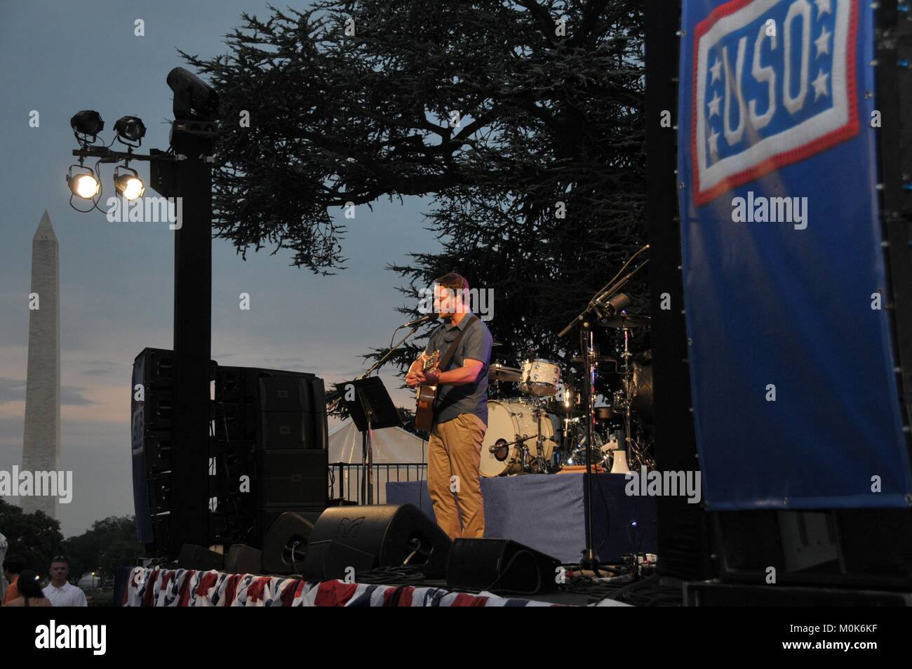 Singer Amos Lee performs on stage during the Salute to the Military USO ...