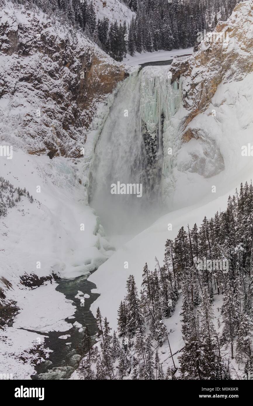 The Lower Falls waterfall is frozen over during winter at the ...